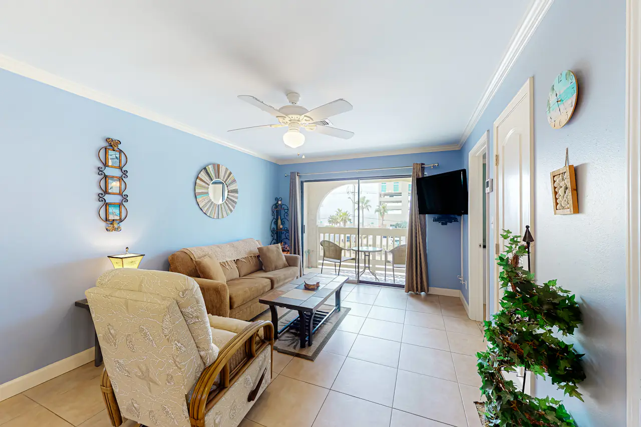 2nd-floor condo near the beach with balcony, outdoor pool, partial ...